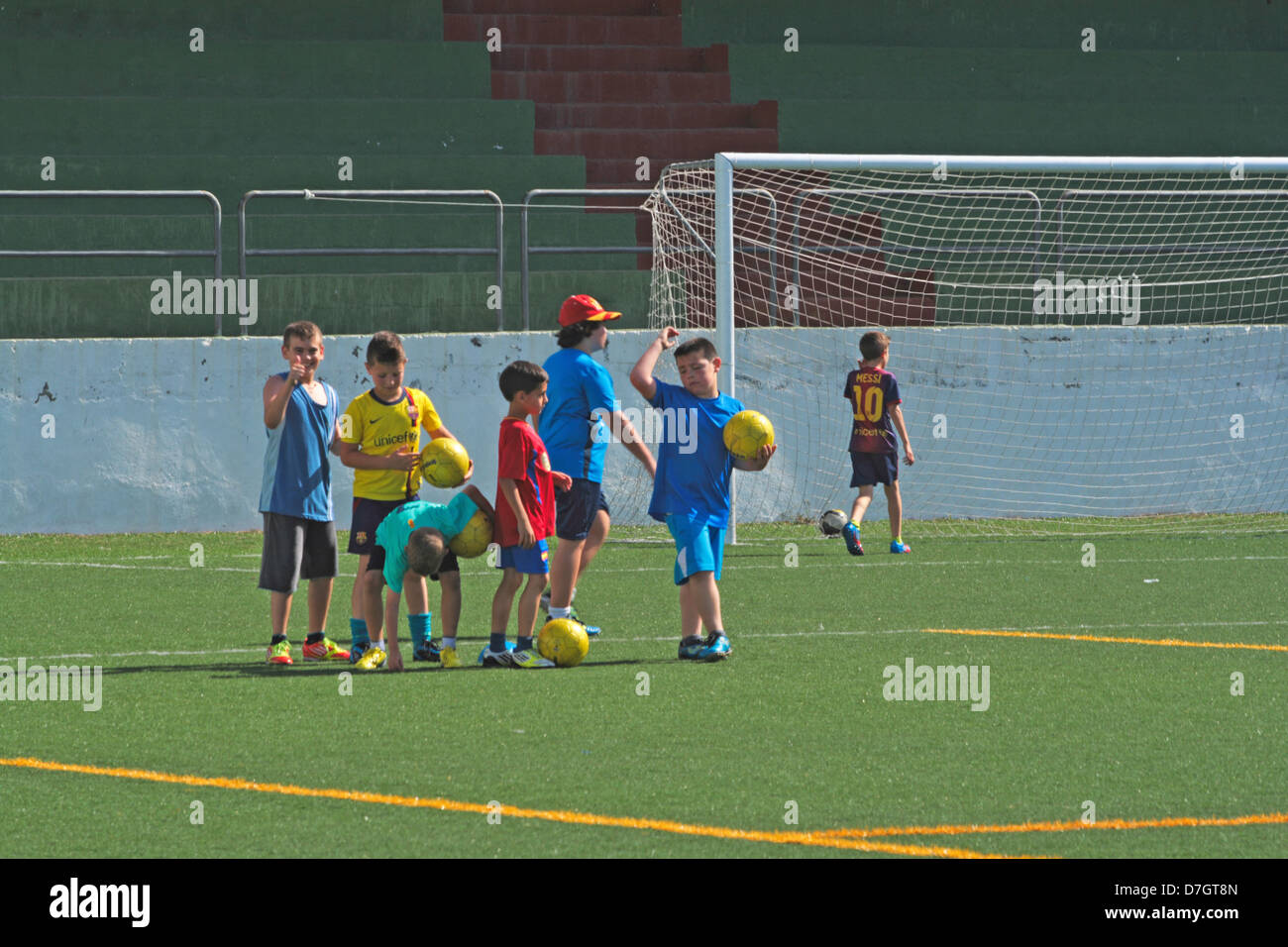 teens playing football Stock Photo - Alamy