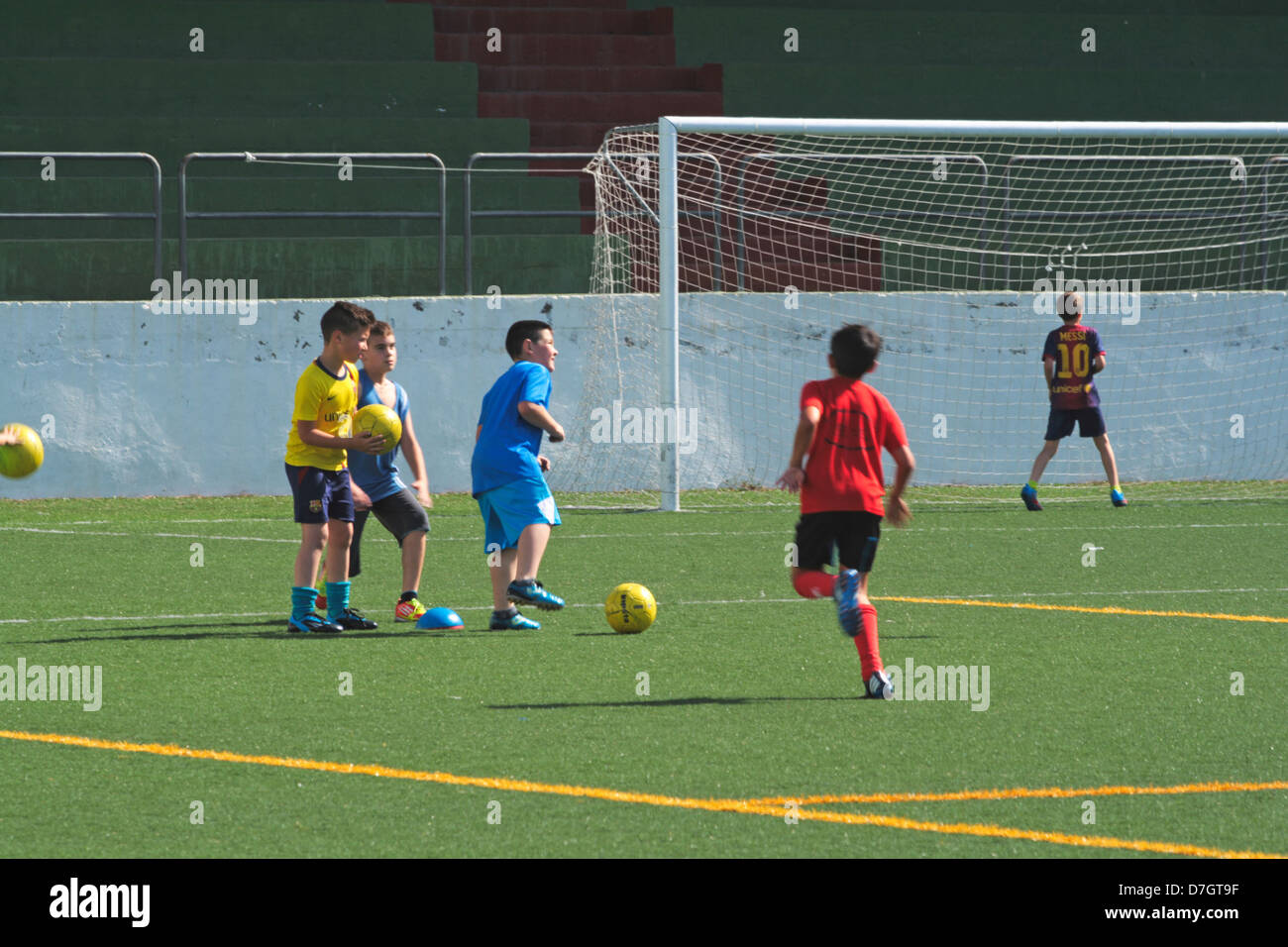 teens playing football Stock Photo - Alamy