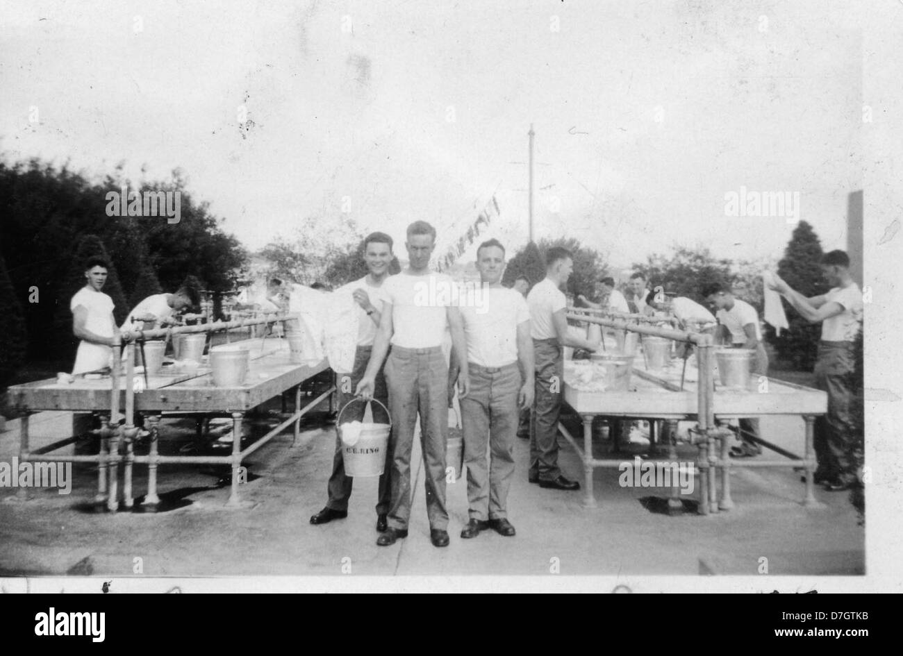 This historical photograph shows the kitchen crew at a Civilian ...