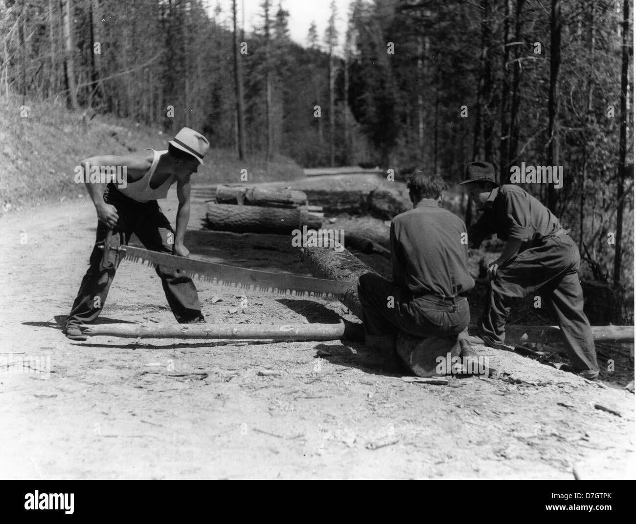 The image shows Civilian Conservation Corps (CCC) workers maintaining ...