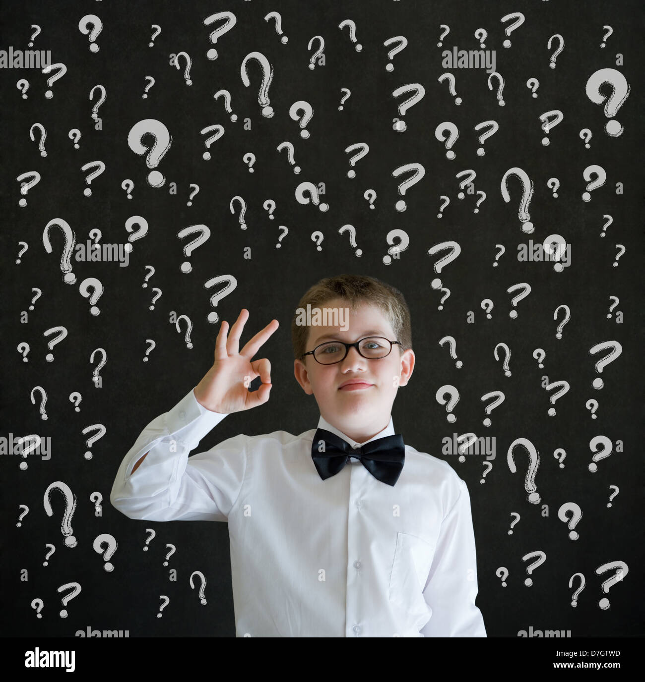 All ok or okay sign boy dressed up as business man with chalk questions ...