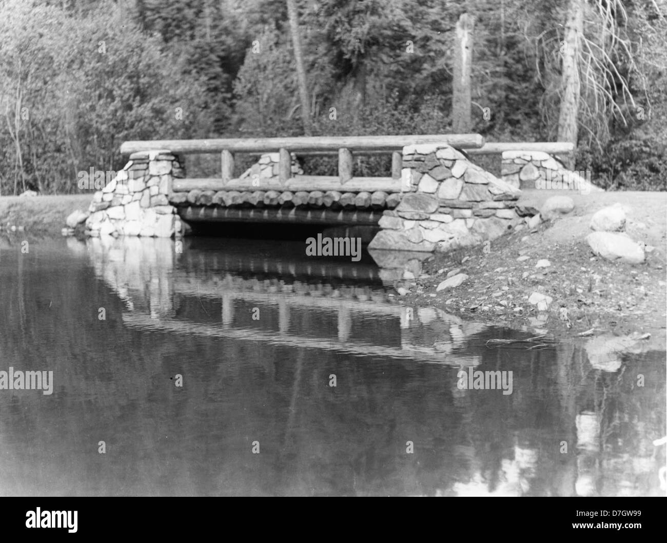 The Tumwater Camp footbridge, photographed by Gerald W. Williams, was ...