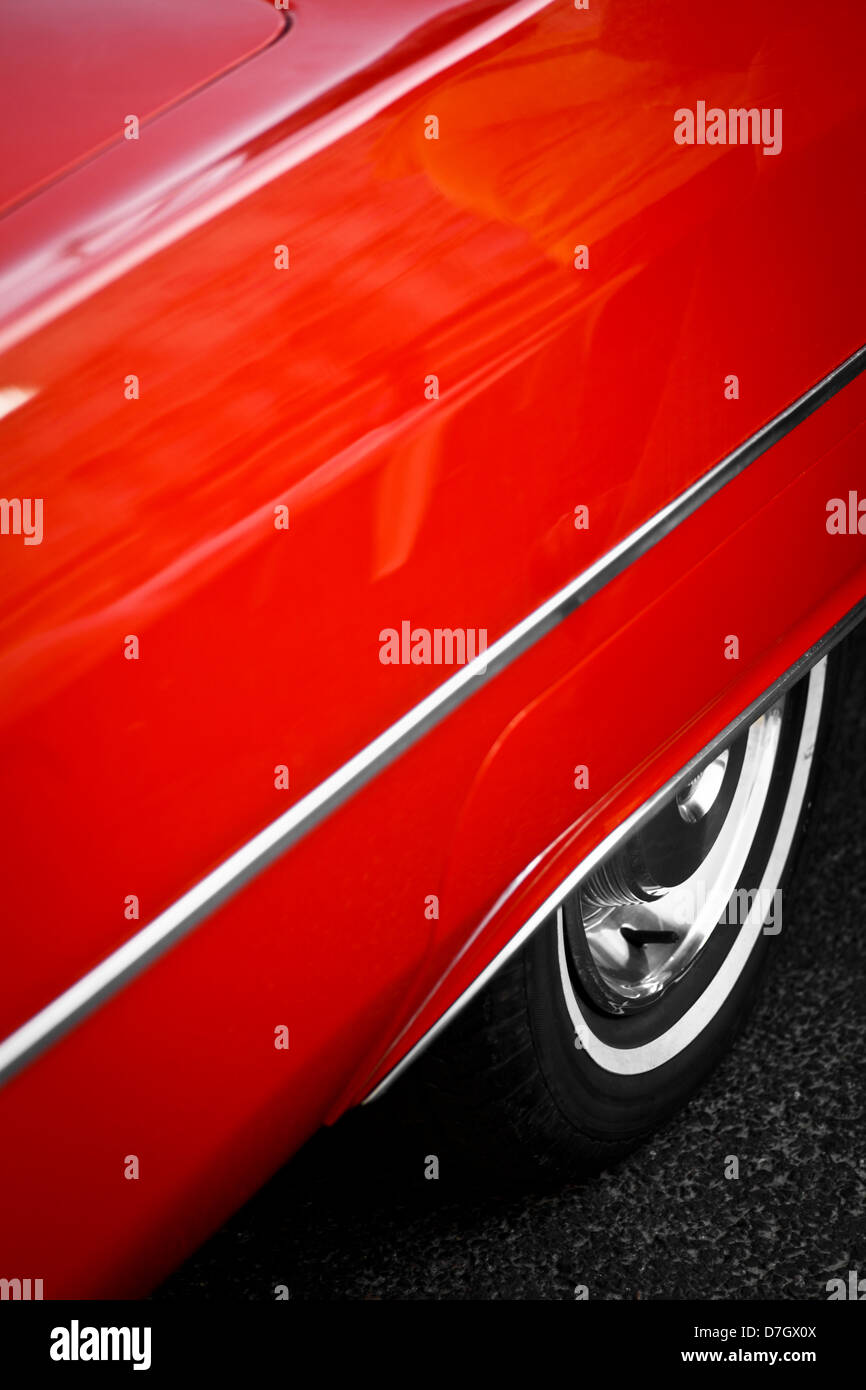 Color detail of the back wheel of a vintage red car Stock Photo - Alamy