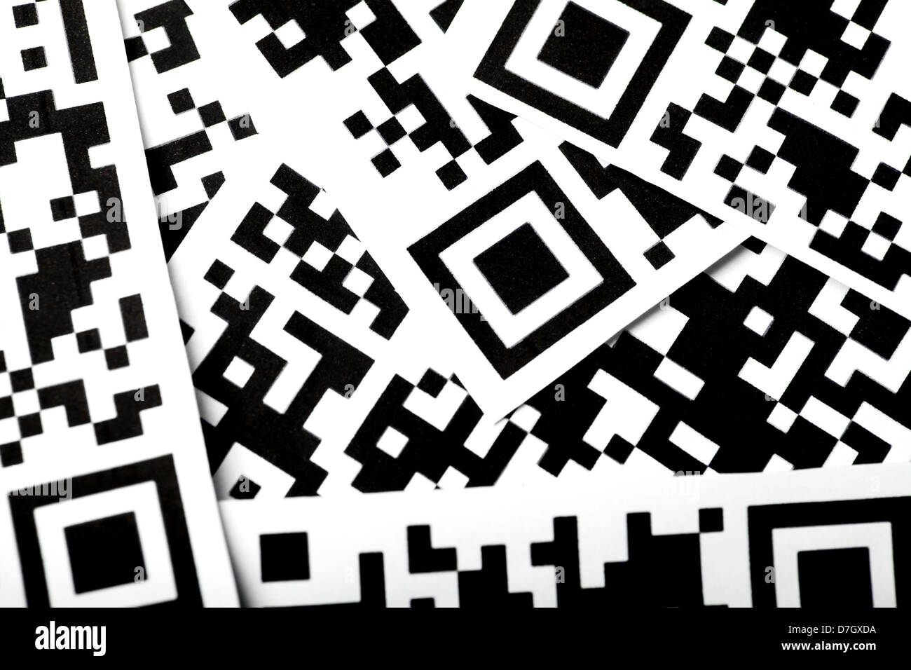 Detail of a few qr codes printed on paper Stock Photo - Alamy