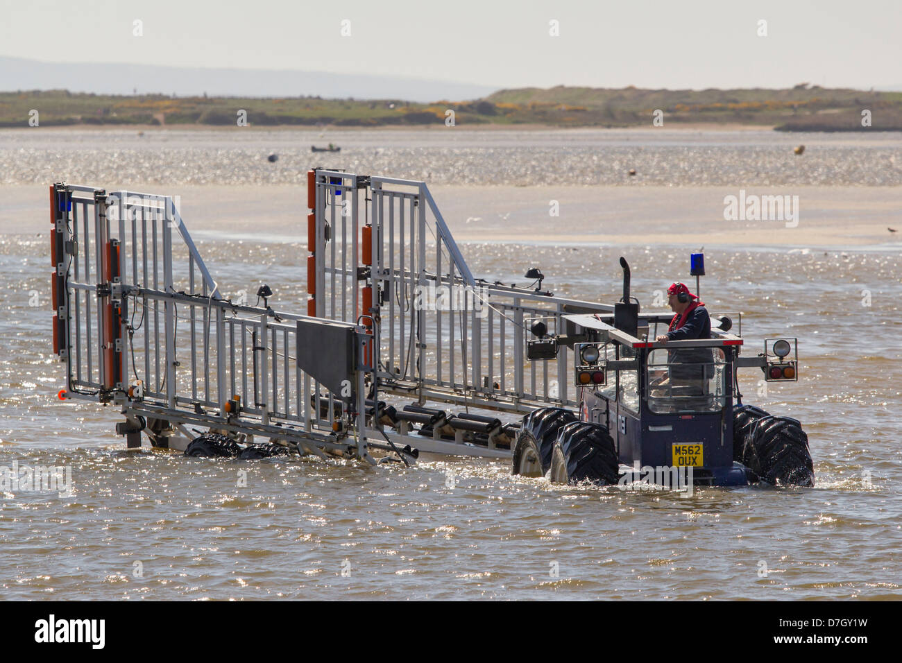 RNLI launch and recovery vehicle tractor returning to Mudeford inshore ...
