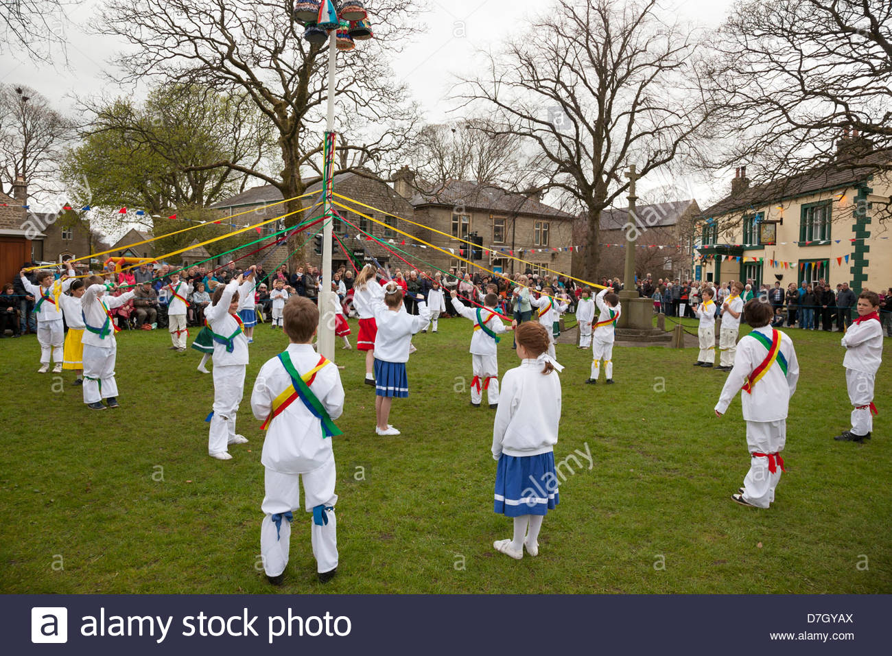 Dancing Round The Maypole On The Village Green High Resolution Stock ...