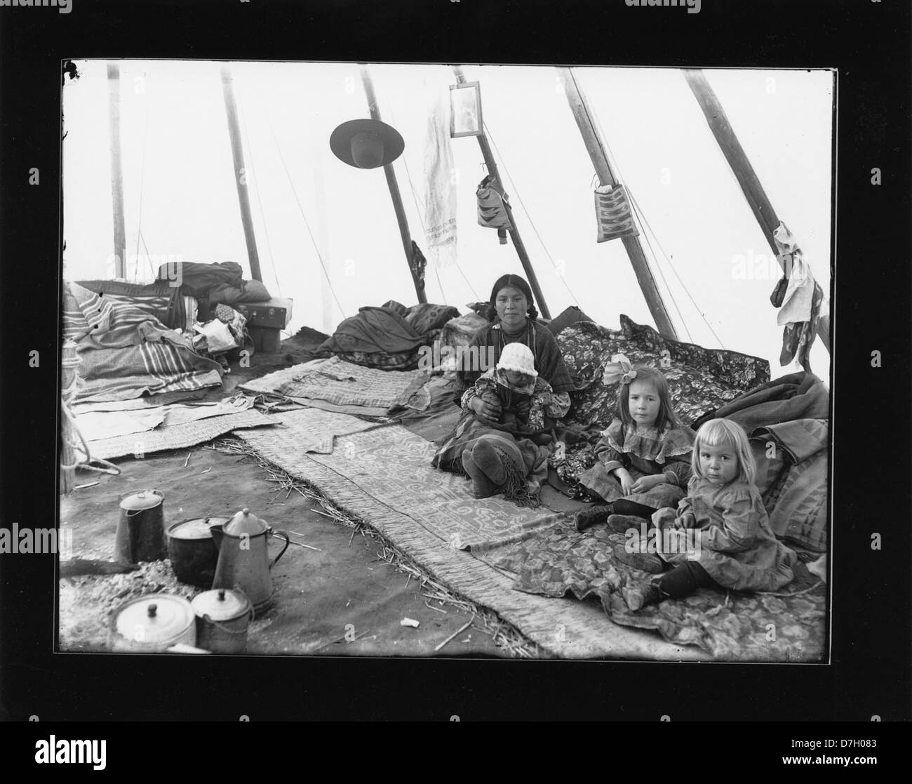 This historical photograph by Benjamin A. Gifford depicts a woman and ...