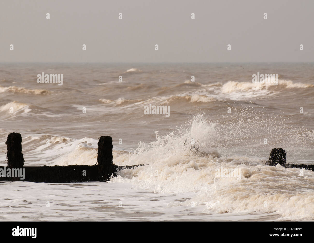 Breaking over the groynes hi-res stock photography and images - Alamy