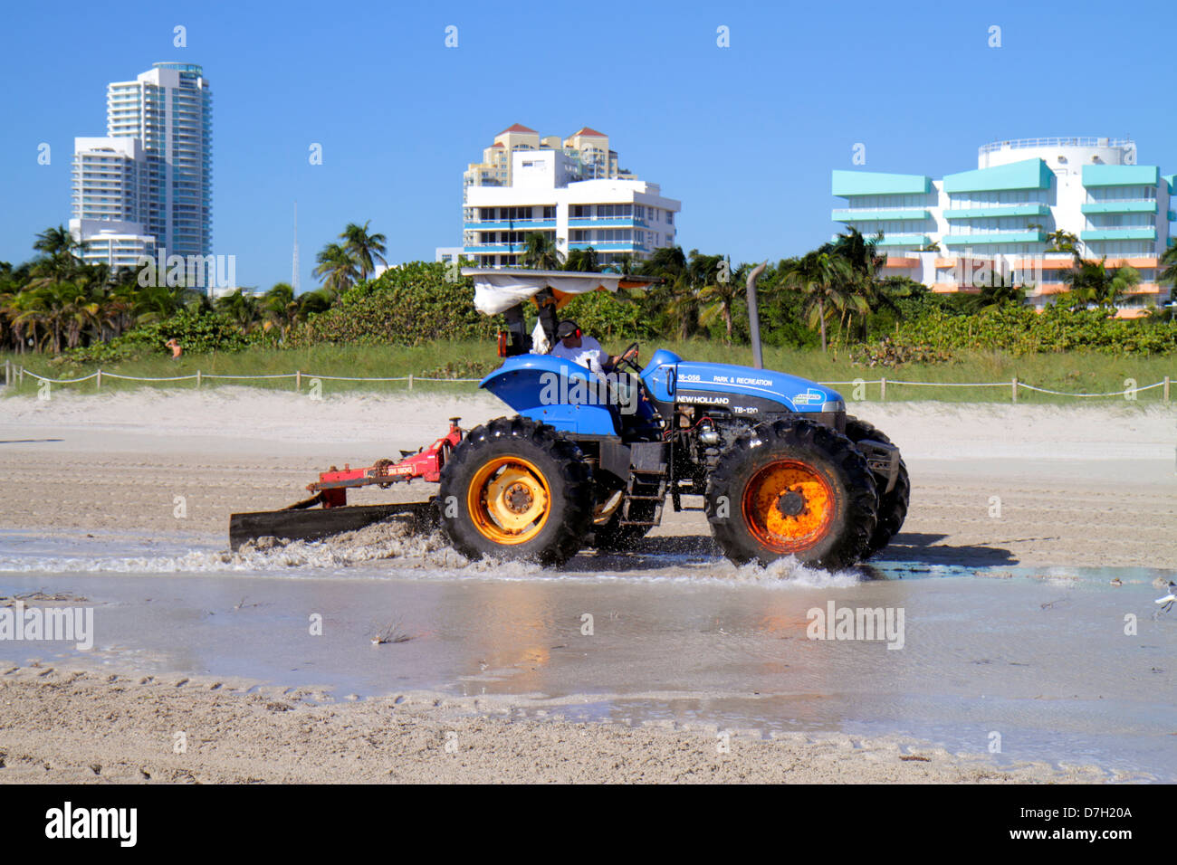 Miami Beach Florida,sand,tractor,plow,erosion,rising ocean levels ...