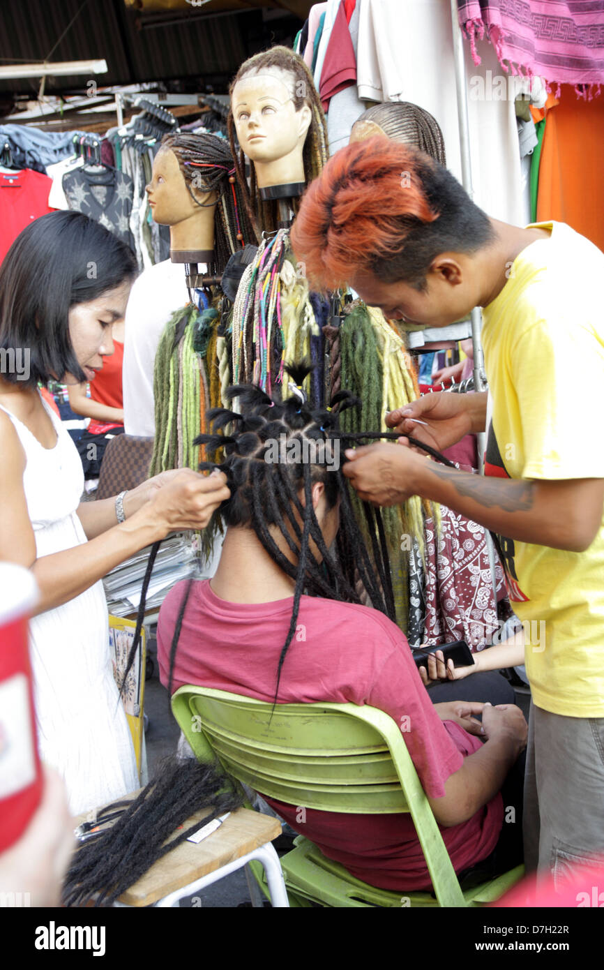Hair Braiding at Khao San Road in Bangkok , Thailand Stock Photo - Alamy