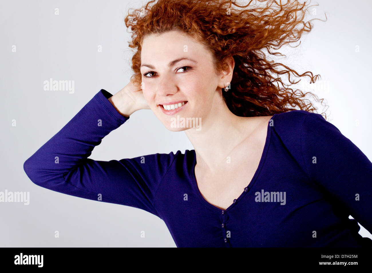 attractive young redhead woman smiling laughing emotion portrait Stock ...