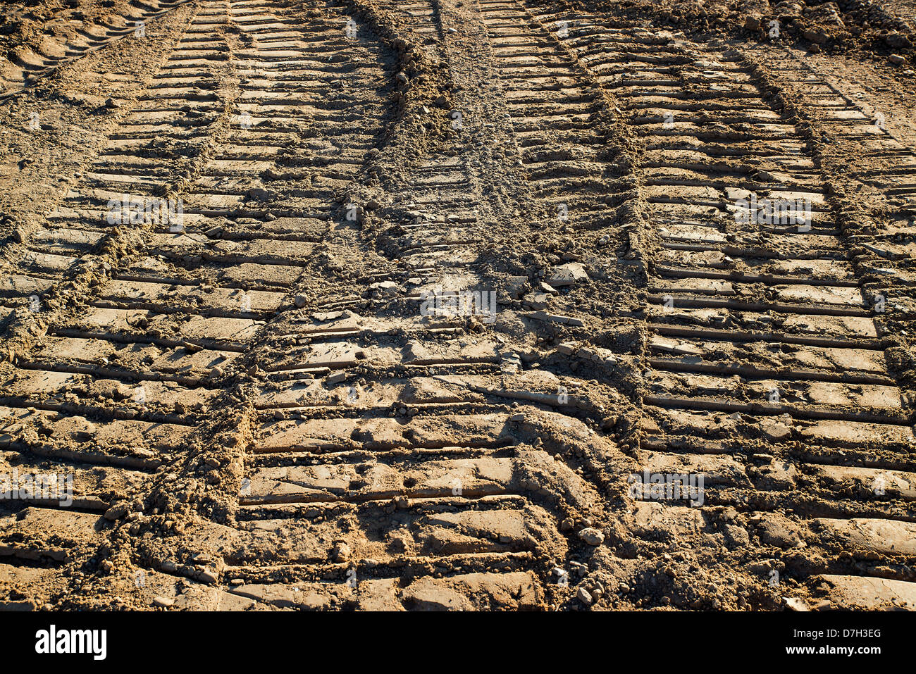 Tractor tracks in soil at housing construction site Stock Photo - Alamy