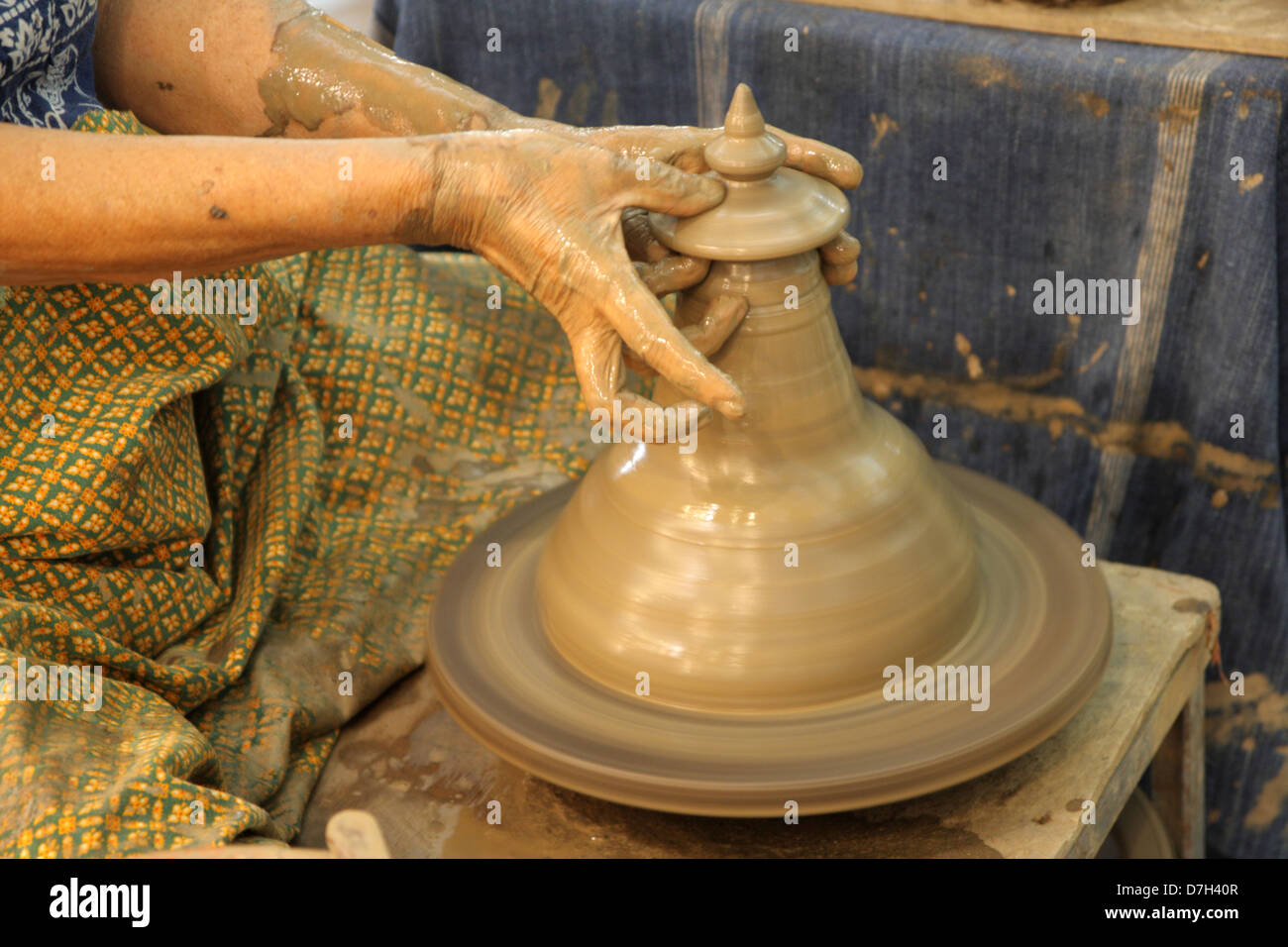 Hand-throwing pottery on wheel to made Thai style pot Stock Photo - Alamy