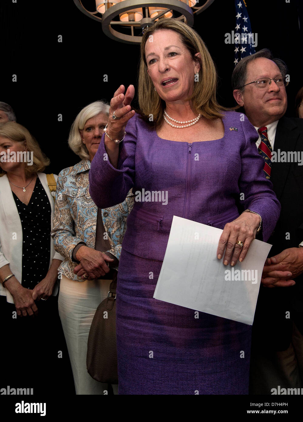 Charleston, South Carolina, USA. 7th May 2013. Flanked by her family ...