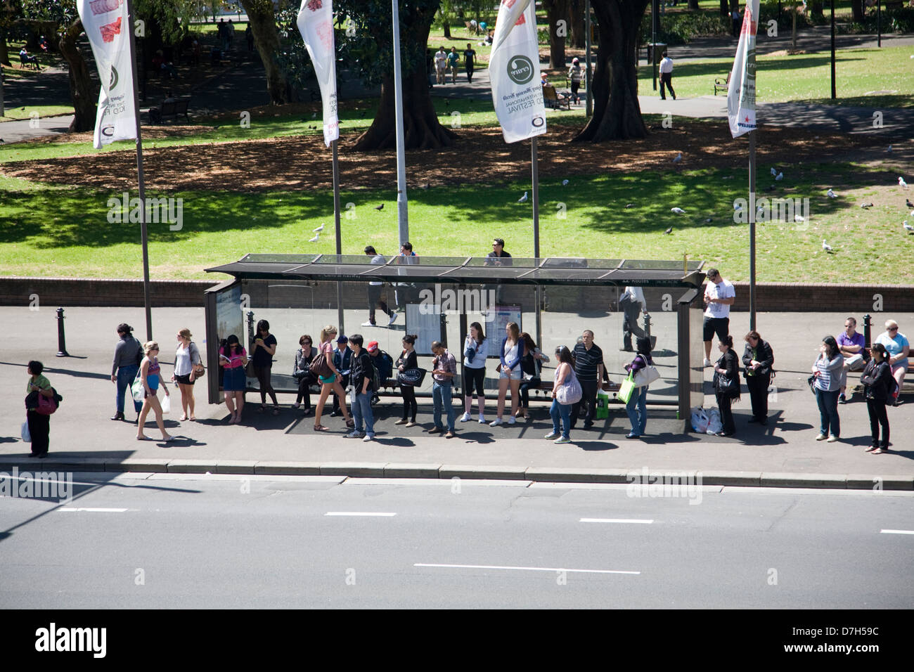 Passengers waiting at bus stop hi-res stock photography and images - Alamy
