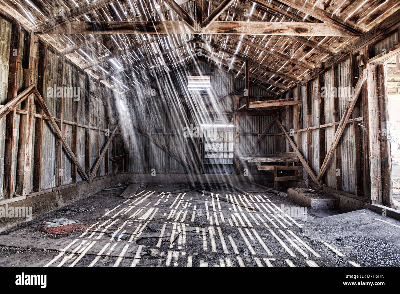 sun rays shining through an old barn roof Stock Photo - Alamy