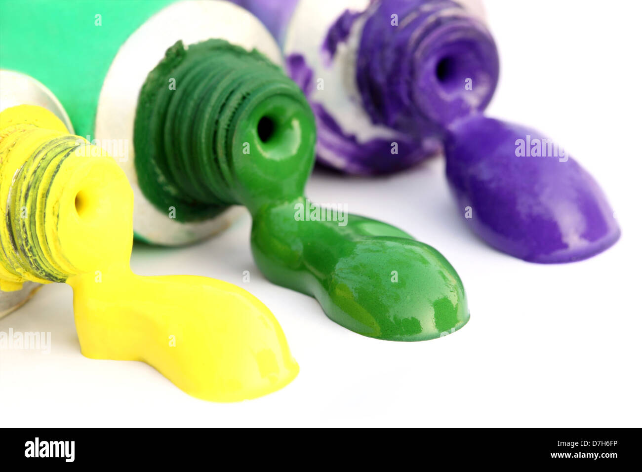 Paint colors over white background Stock Photo - Alamy