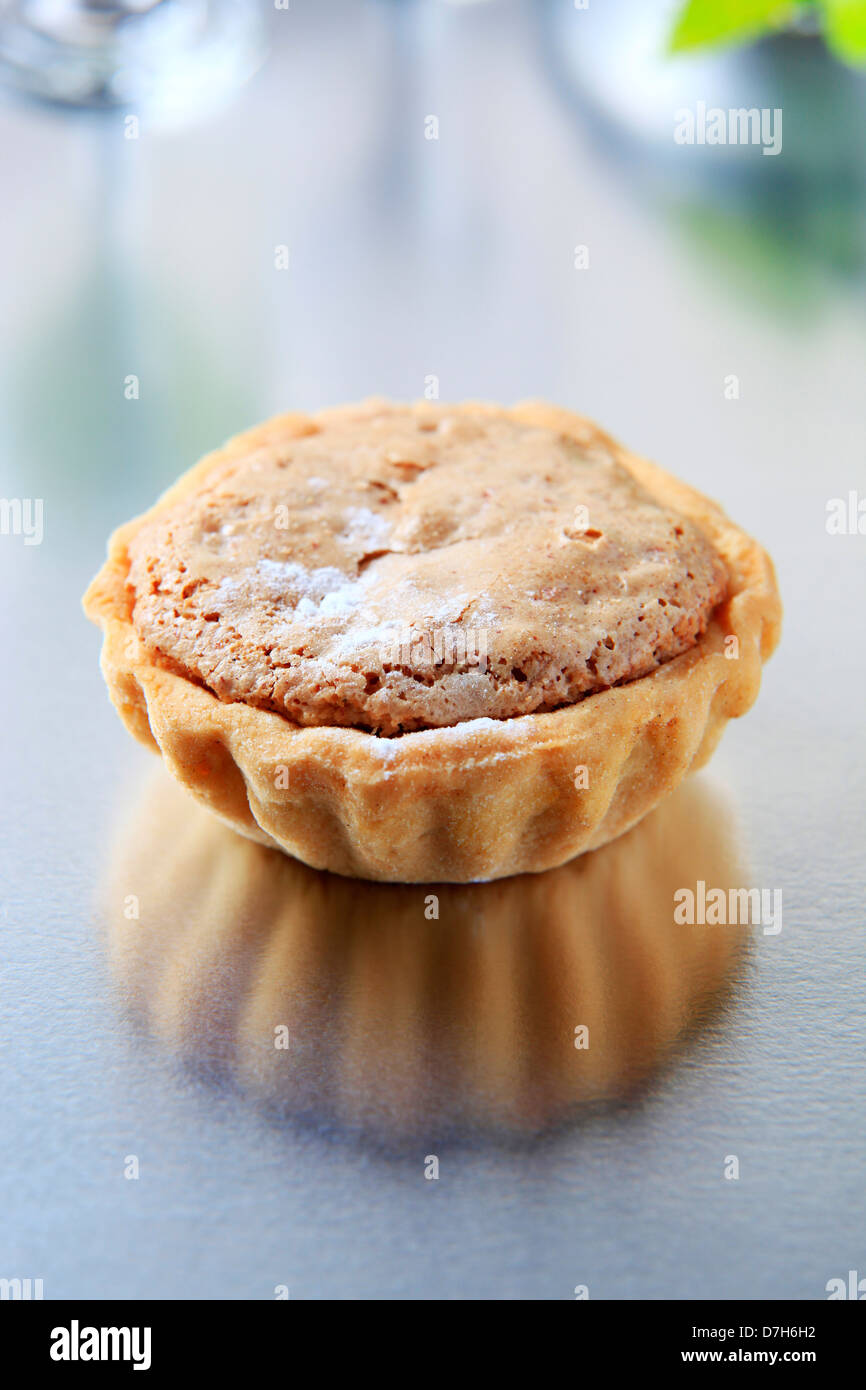 Small shortbread tart shell with nut filling Stock Photo - Alamy