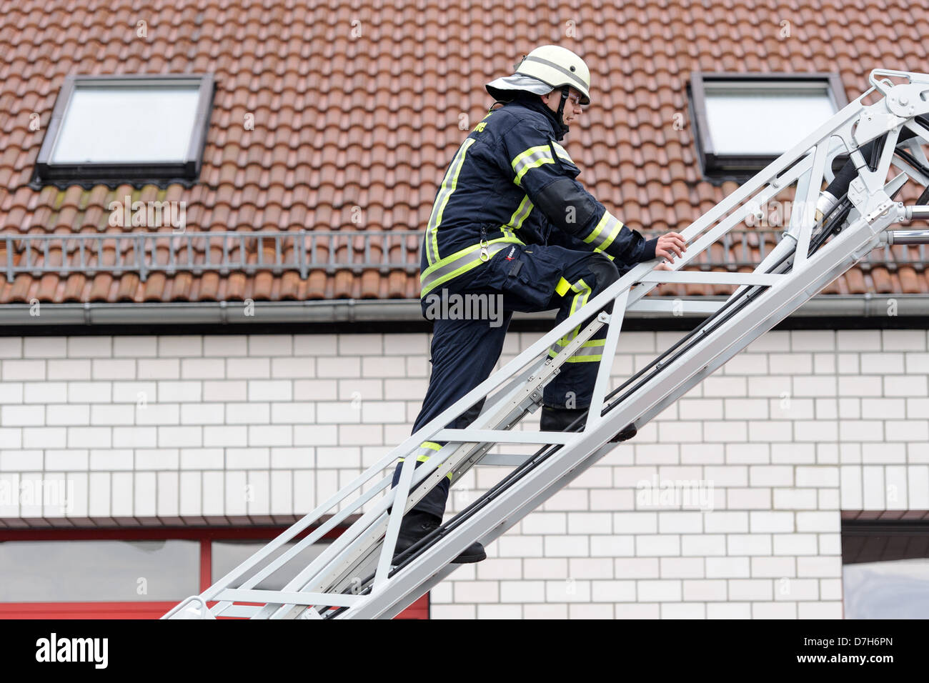 Fire department climbs ladder hi-res stock photography and images - Alamy