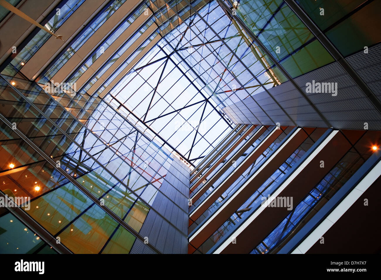 Bright and colourful atrium of a modern glass building Stock Photo - Alamy