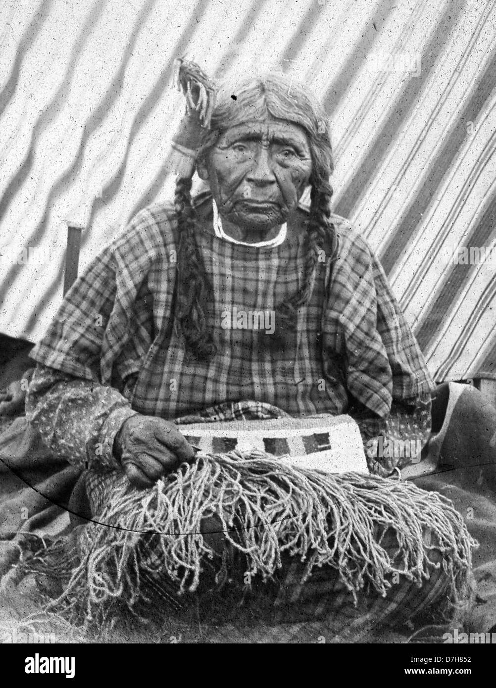 This historical photograph features a 100-year-old Native American ...