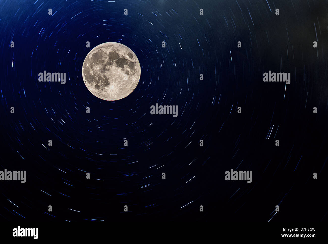 Stars turning around the moon Stock Photo - Alamy
