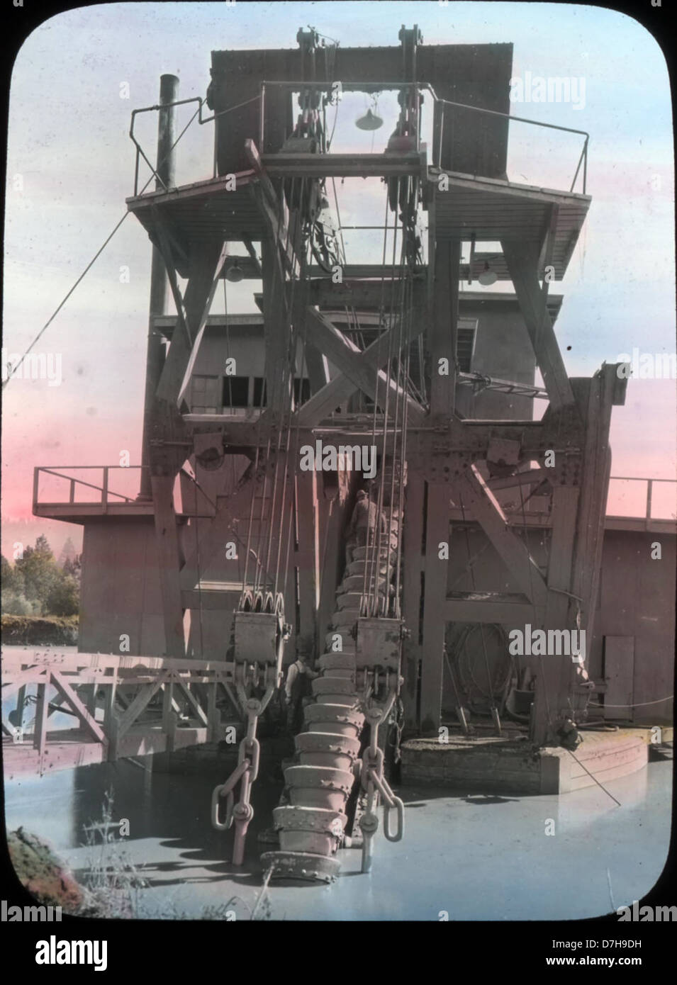 An image of a gold dredge used in Oregon Industries during the early ...