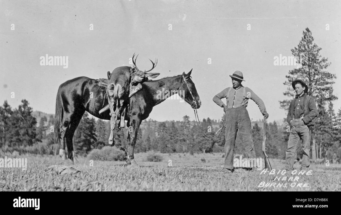 Two hunters Black and White Stock Photos & Images - Alamy