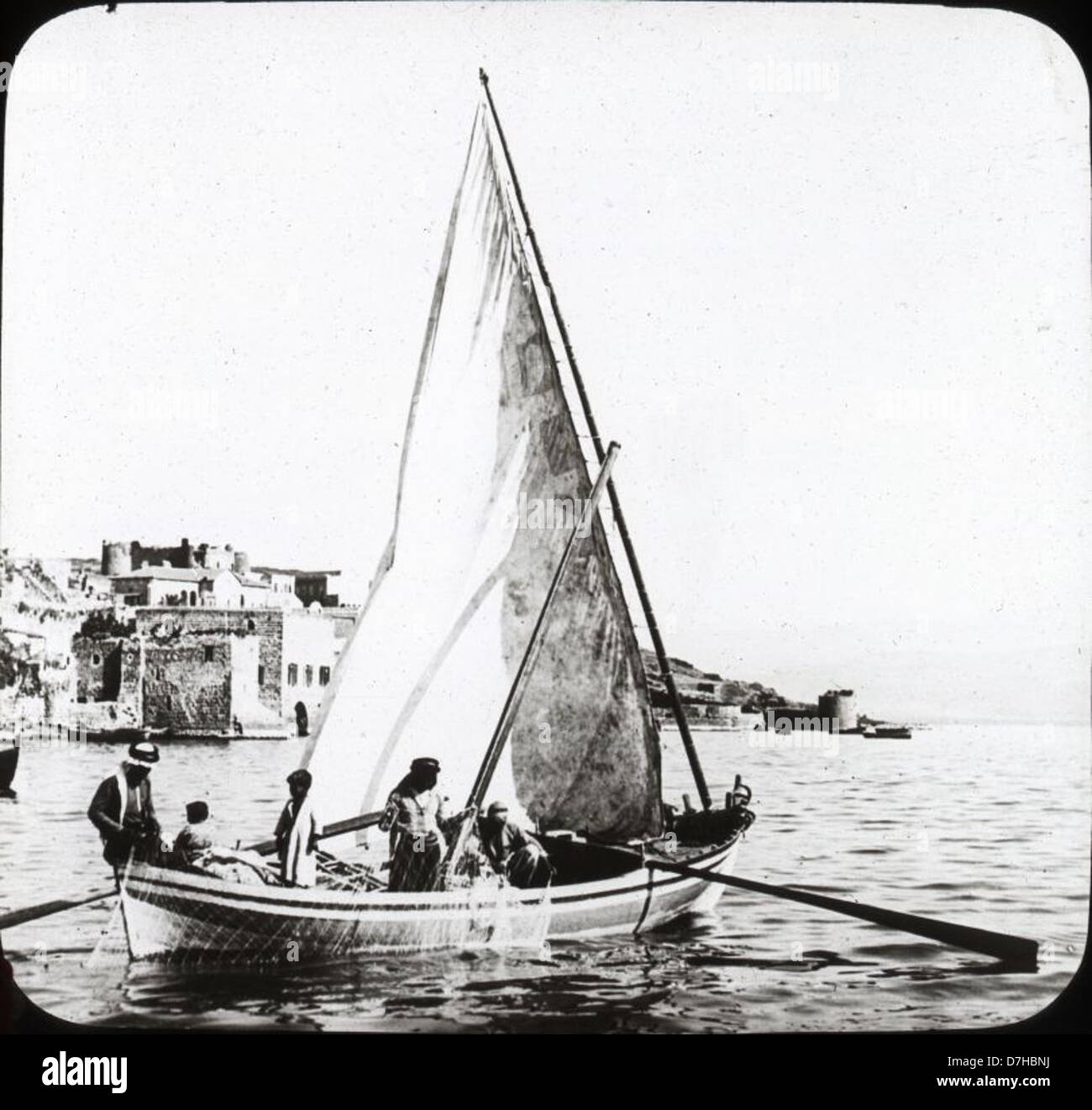 This image captures the tranquil scene of fishing on the Sea of Galilee ...