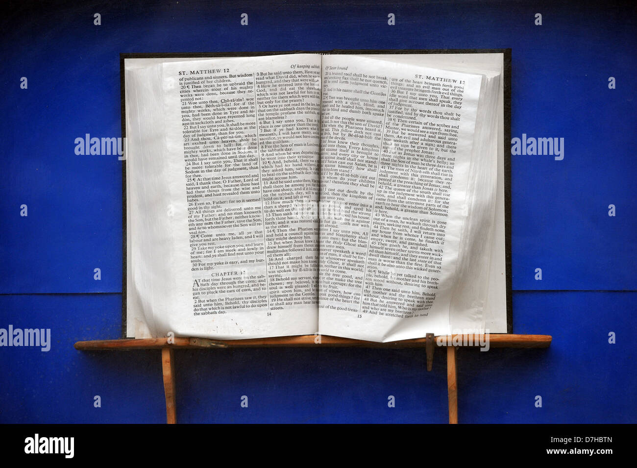 A bible is pictured in a window built into a church wall Stock Photo ...