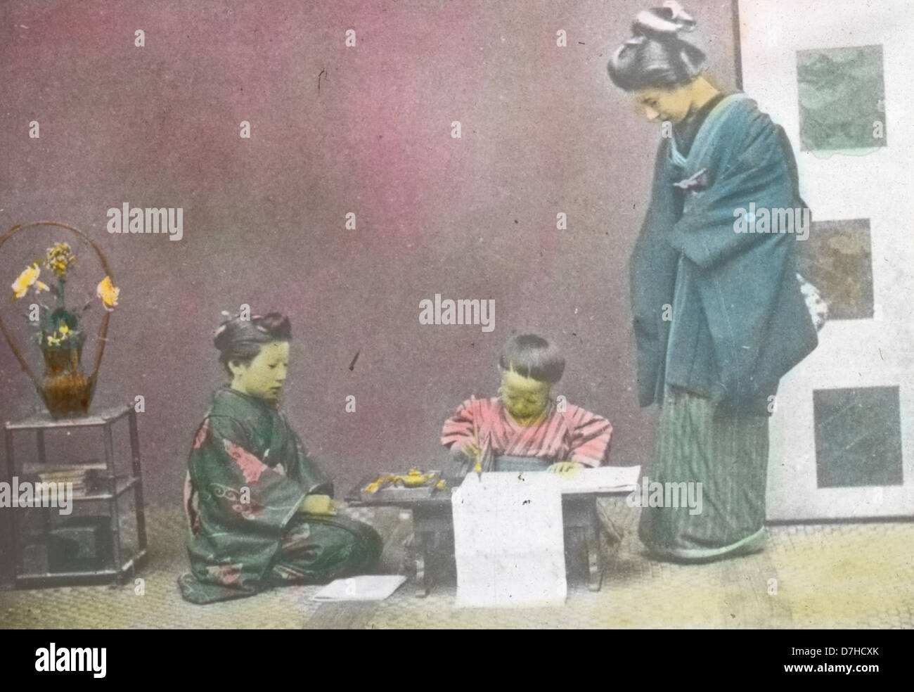 This photograph showcases a group of children learning to write in ...