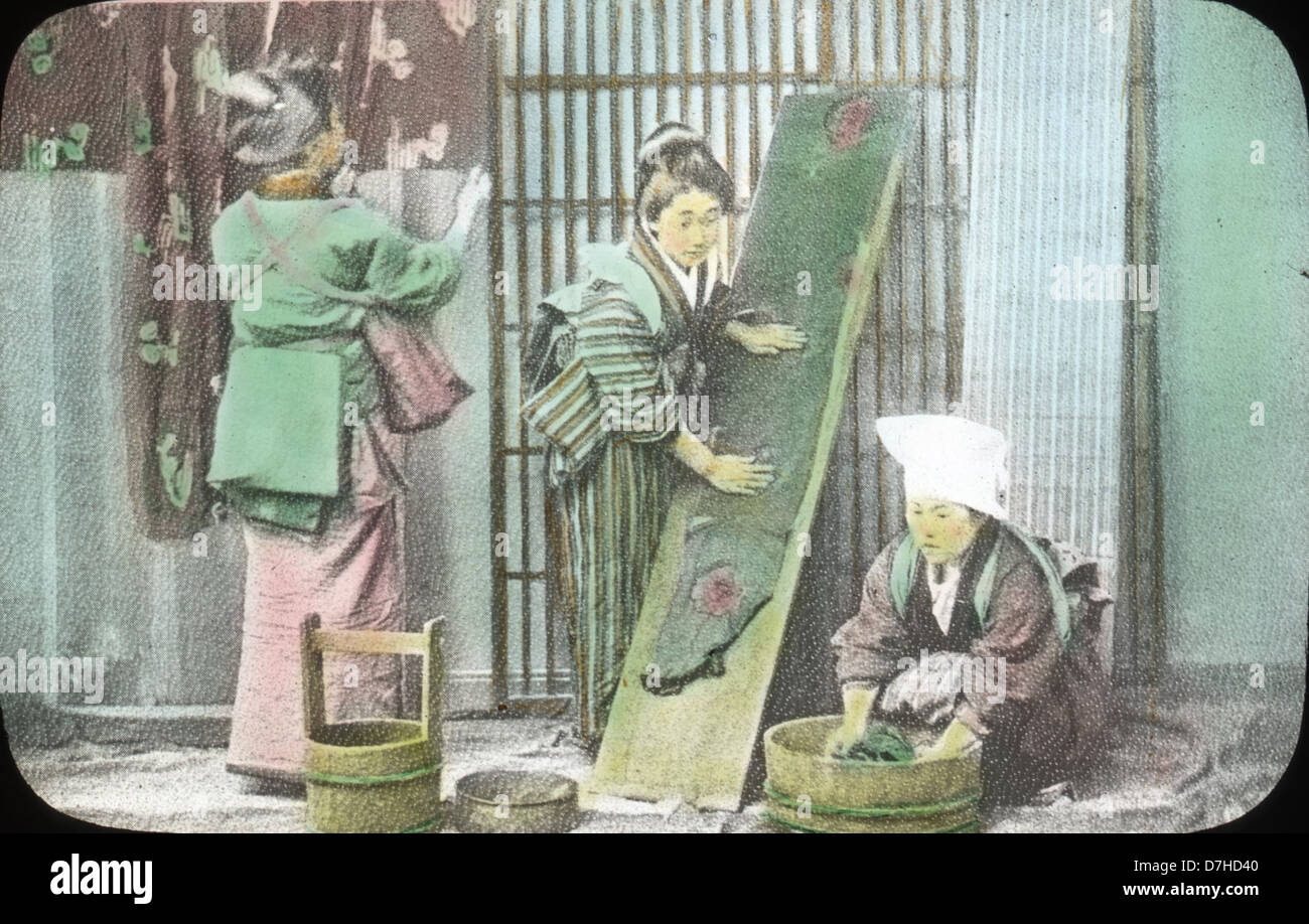 This photograph captures the traditional process of washing kimonos in ...