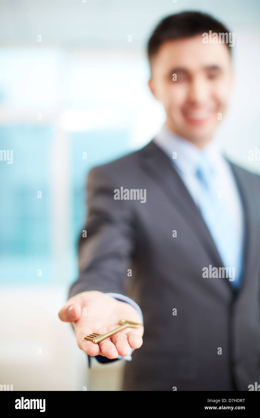 Businessman holding key hi-res stock photography and images - Alamy