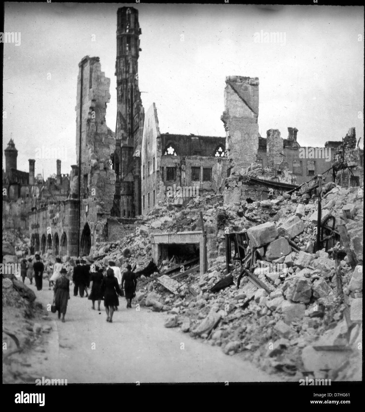 This photograph captures the devastation of a bombed building in ...