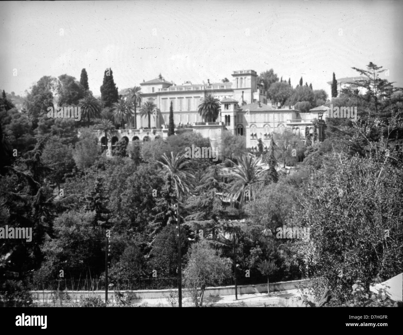 This post-WWII photograph depicts a decadent mansion in France ...