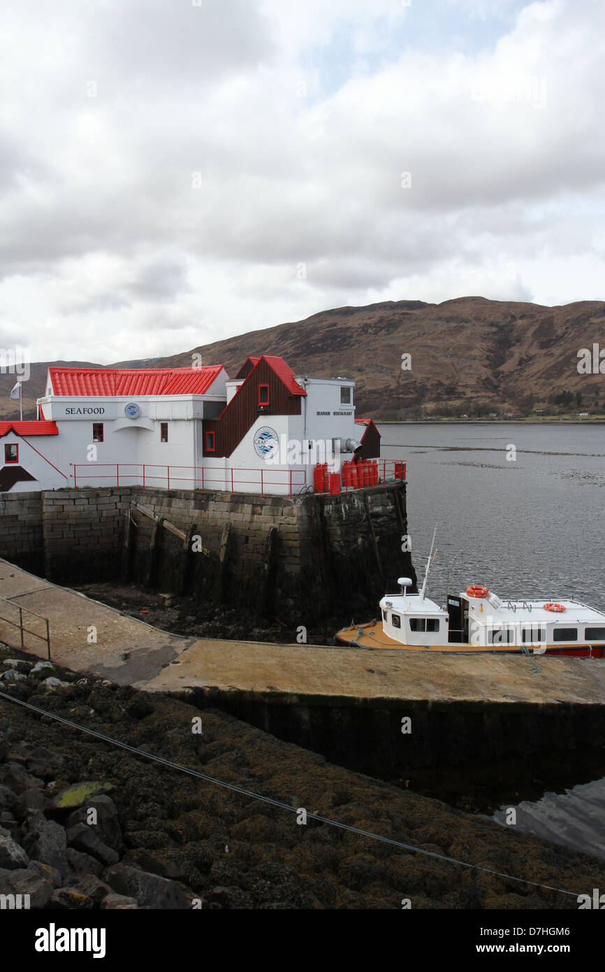 Ferry moored beside Crannog restaurant Fort William Scotland April 2013 ...