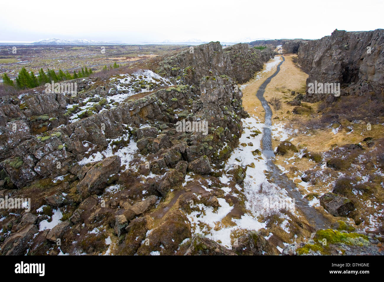 Path through the pingvellir valley in Iceland. The valley lies between ...