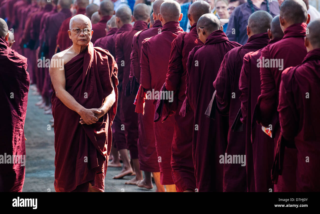 Novice monks queuing for lunch, Mahagandayon Monastery, Mandalay, Burma ...