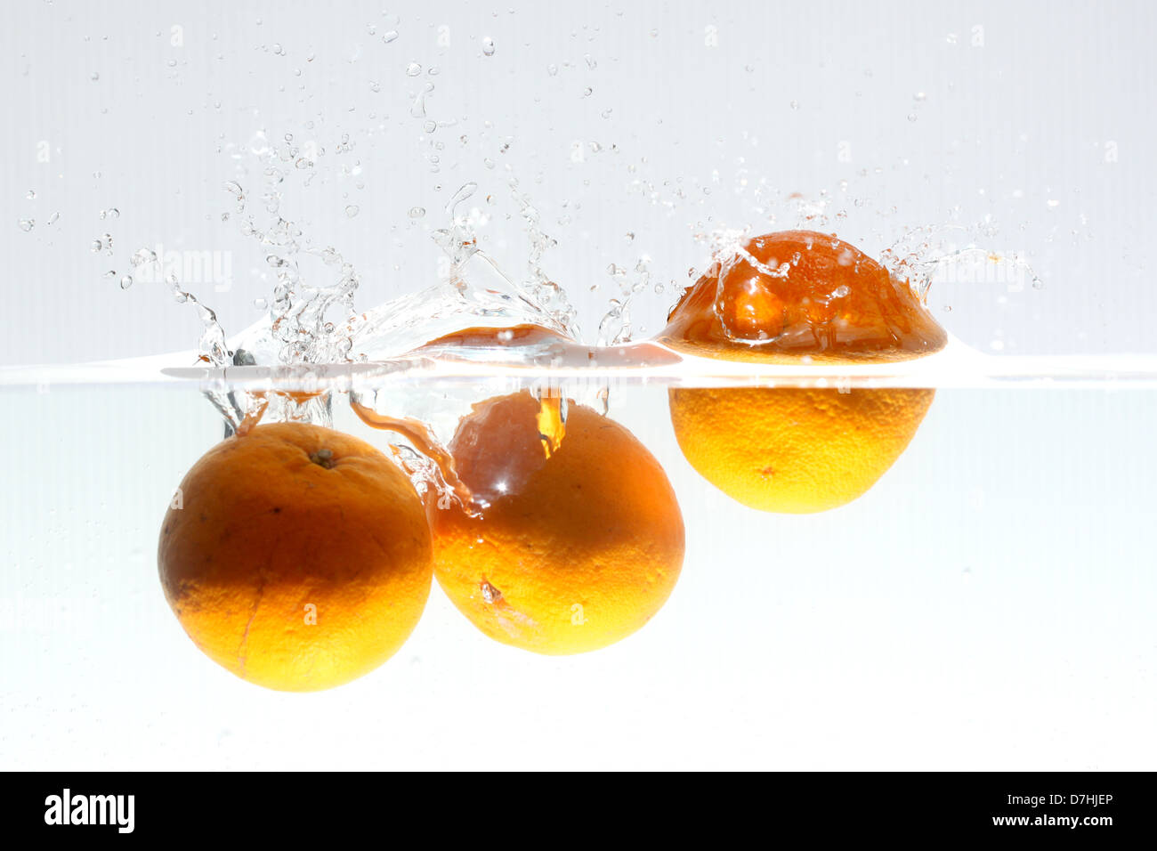 Orange water splash hi-res stock photography and images - Alamy