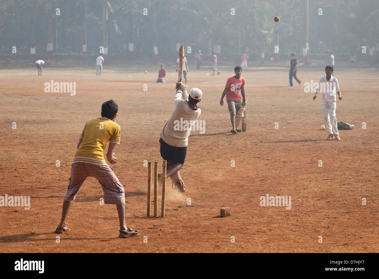 Boys playing cricket at the Oval Maidan in Mumbai, India Stock Photo ...
