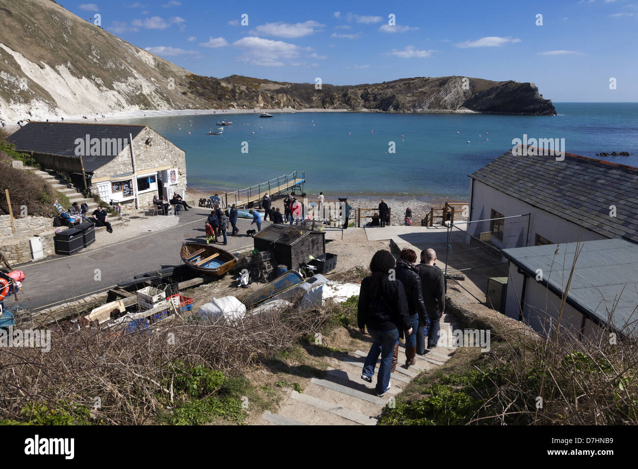 Lulworth Cove is a cove near the village of West Lulworth, on the ...