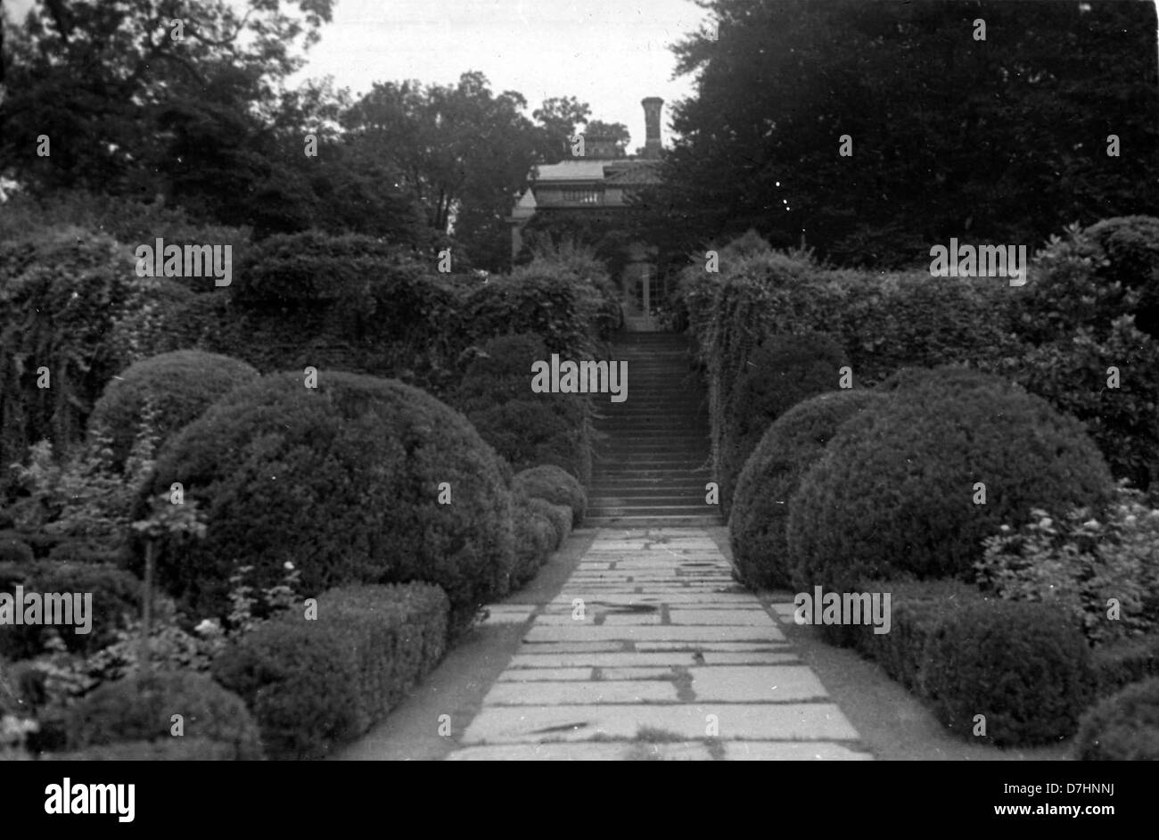 This image shows a garden layout with a central cross axis, flanked by ...