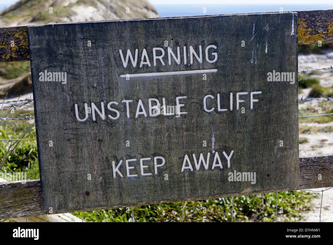 Unstable cliff warning sign on the Jurassic Coast in Dorset Southern ...