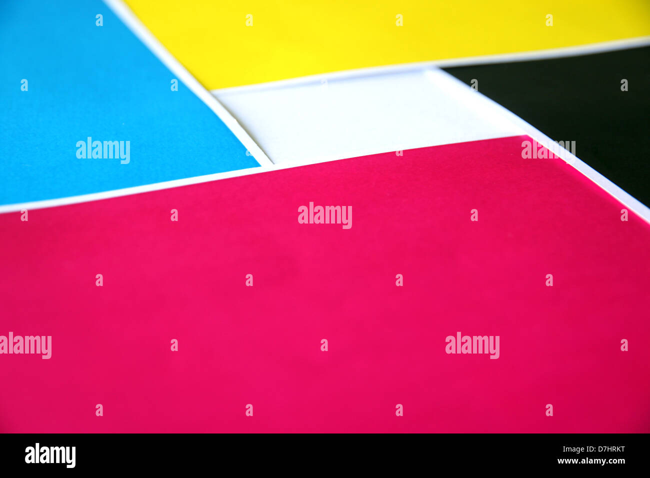 Five colors sheets of paper stacked atop to the new image Rams into ...