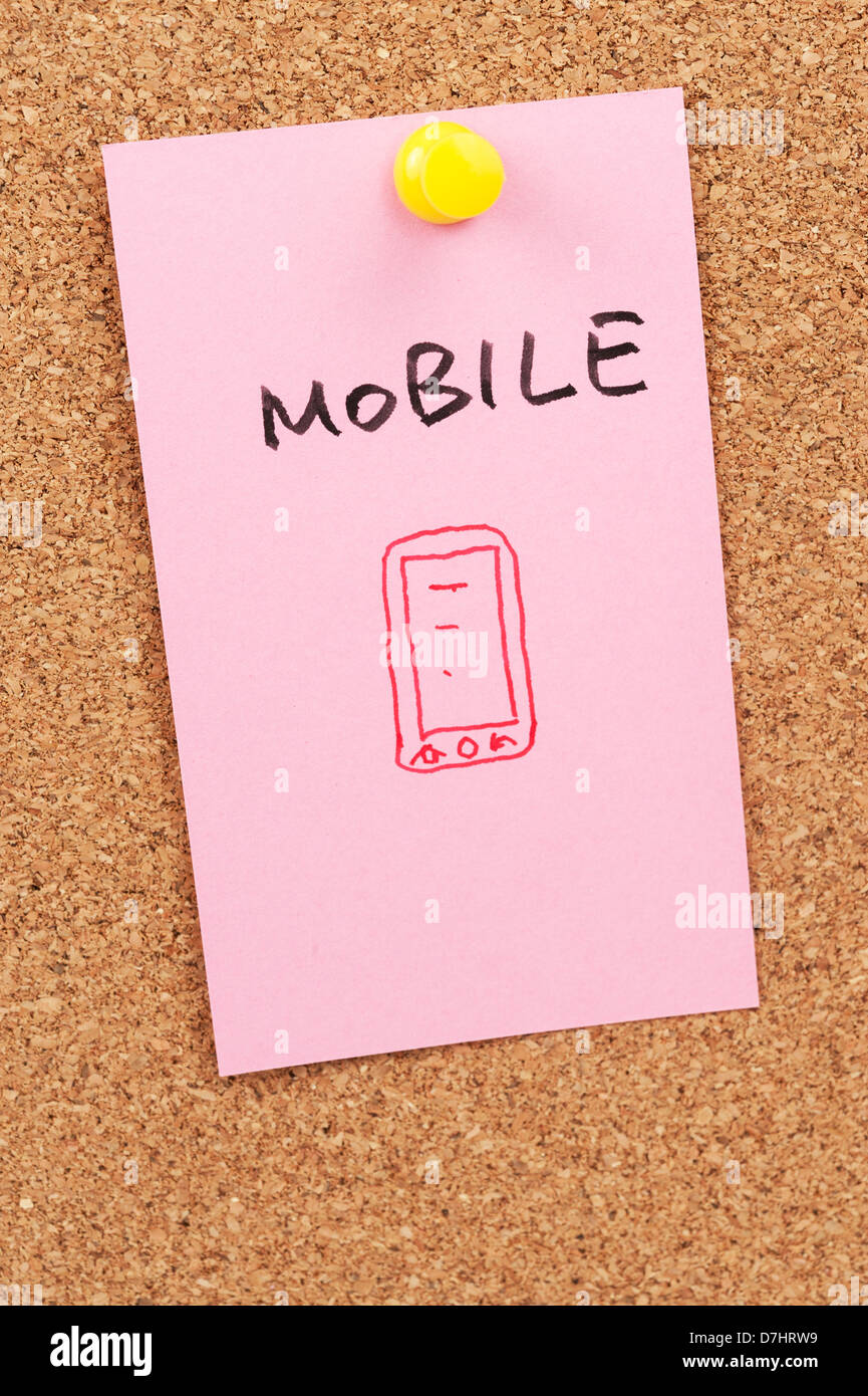 Mobile word and symbol drawn on paper and pinned on cork board Stock ...