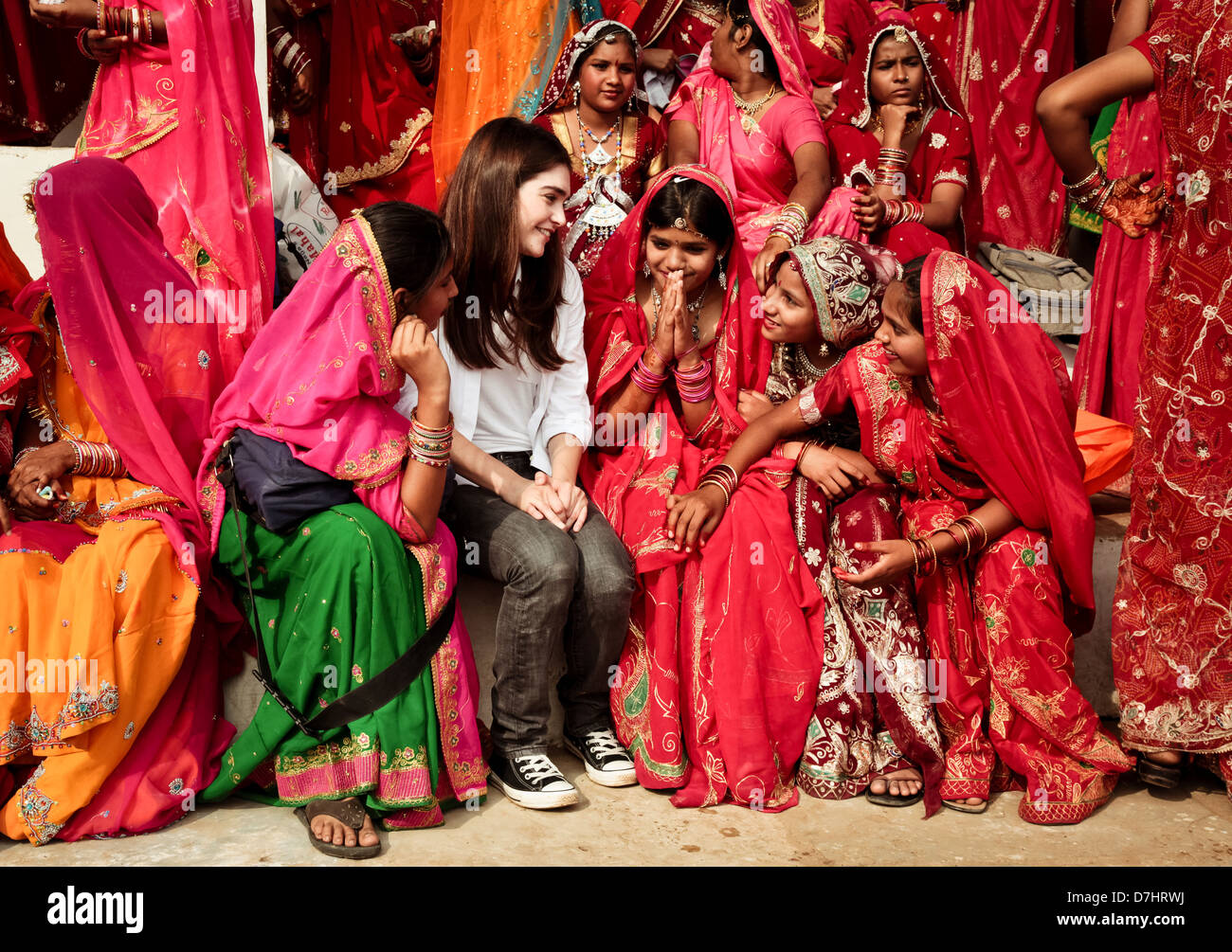 foreigner girl is welcomed by Indian Rajasthani girls at Pushkar fair ...