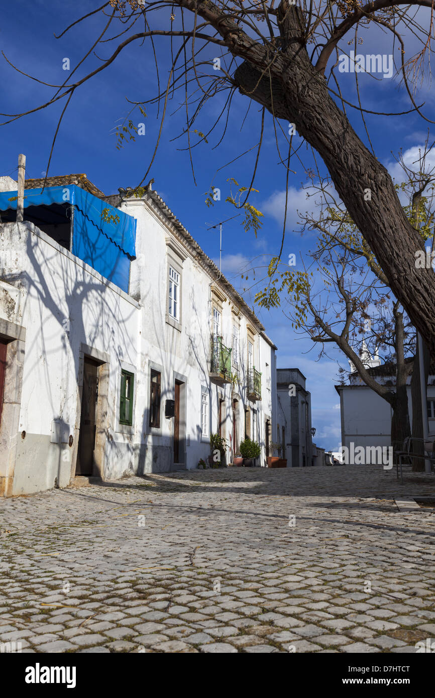 Cobbled square and street in Tavira, Portugal. Low angle view Stock ...