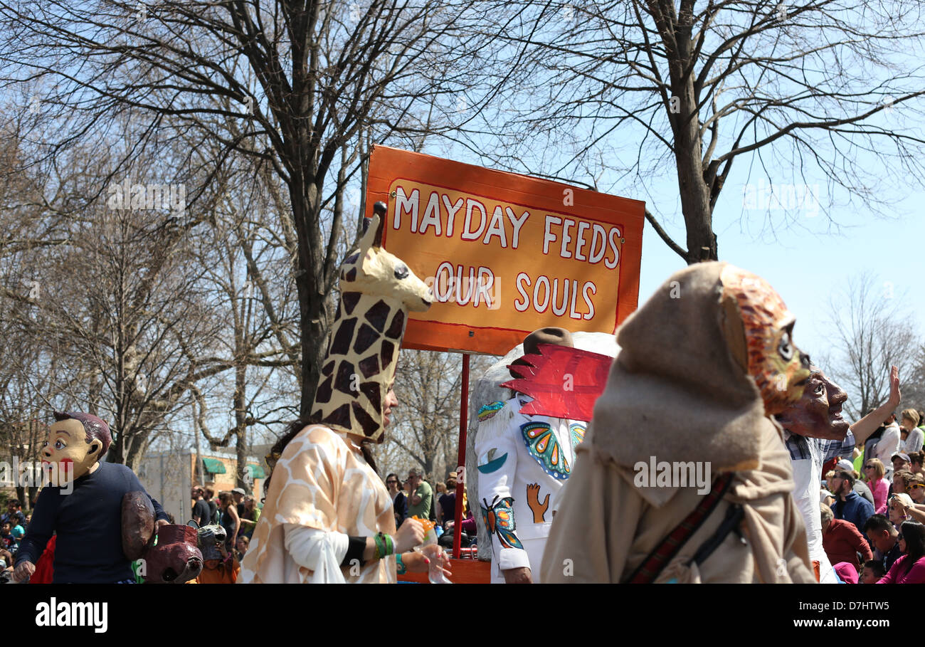 People in costume marching at the May Day parade in Minneapolis ...