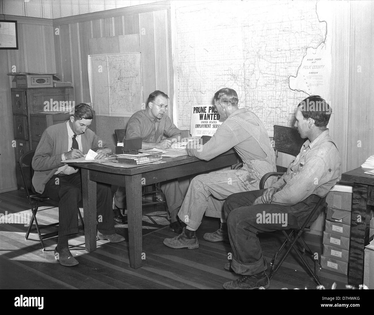The image from 1943 captures the process of labor contracting ...