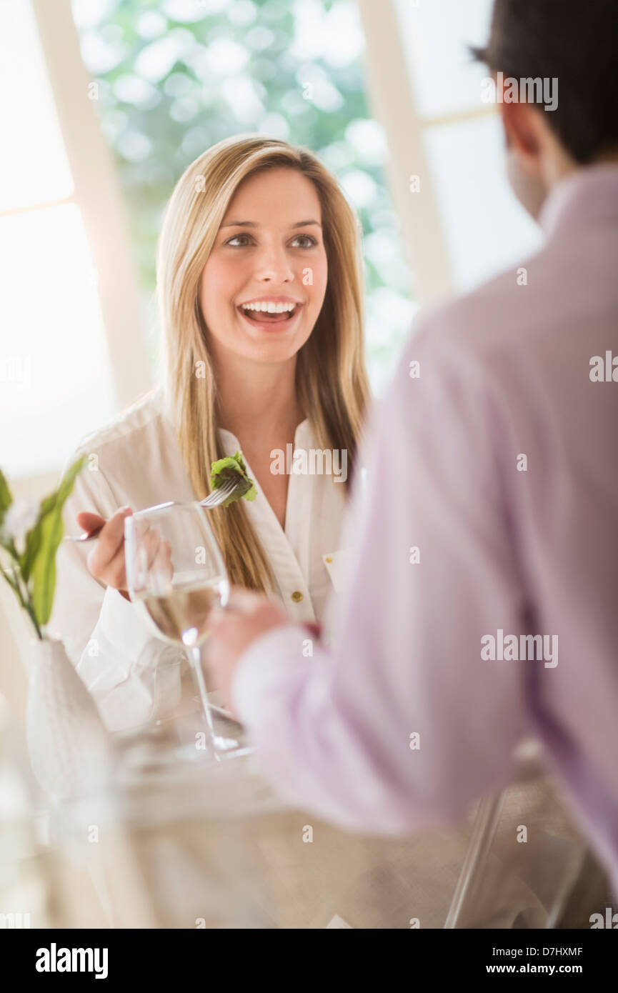 Couple eating dinner in restaurant Stock Photo - Alamy